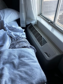 AC unit close to bed