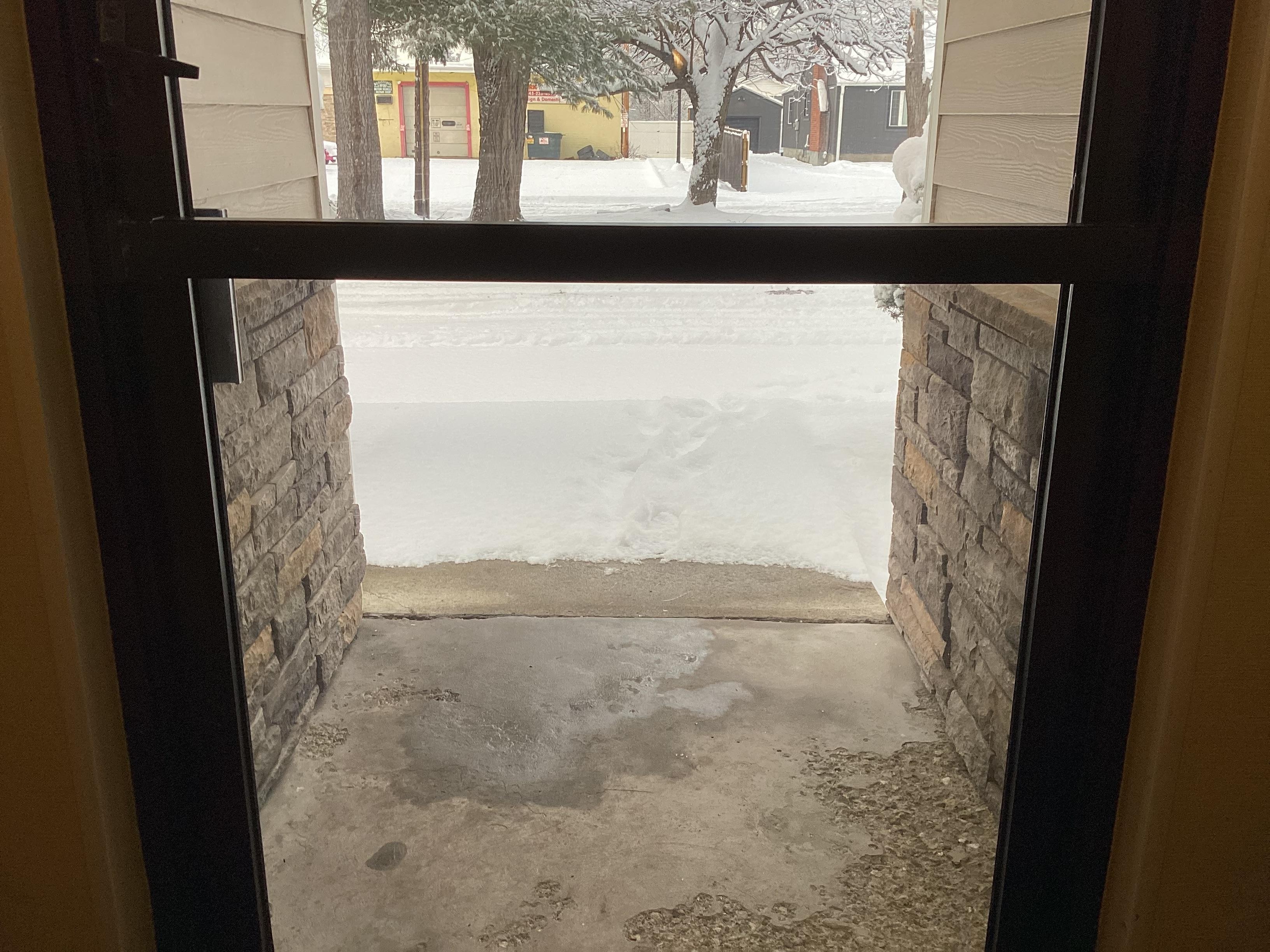 The walkway leading out to the driveway and parking lot.  This stayed like this for hours.