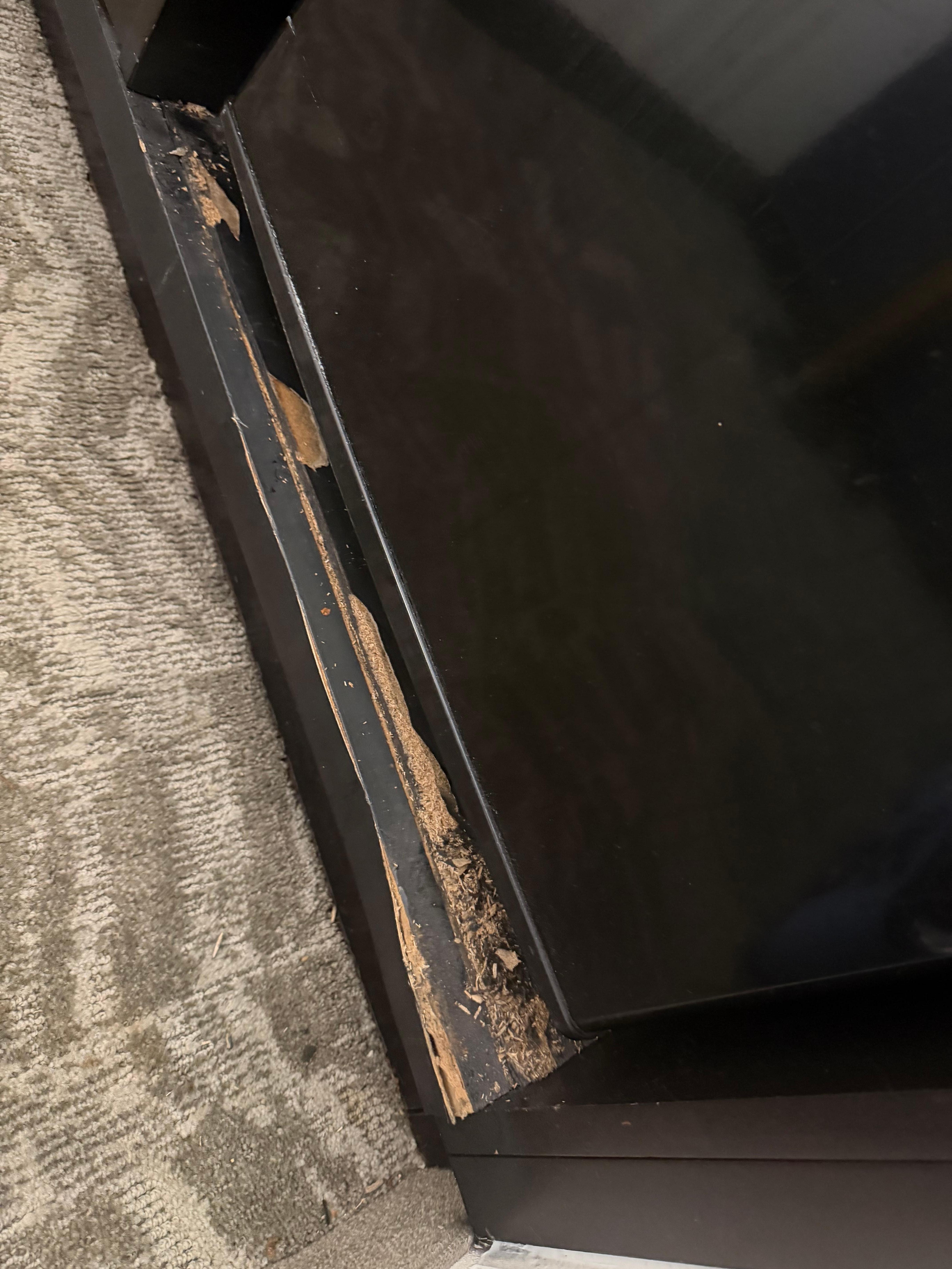 The mini fridge was falling in