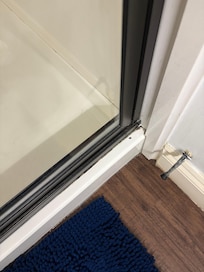 Built up grime in and around shower