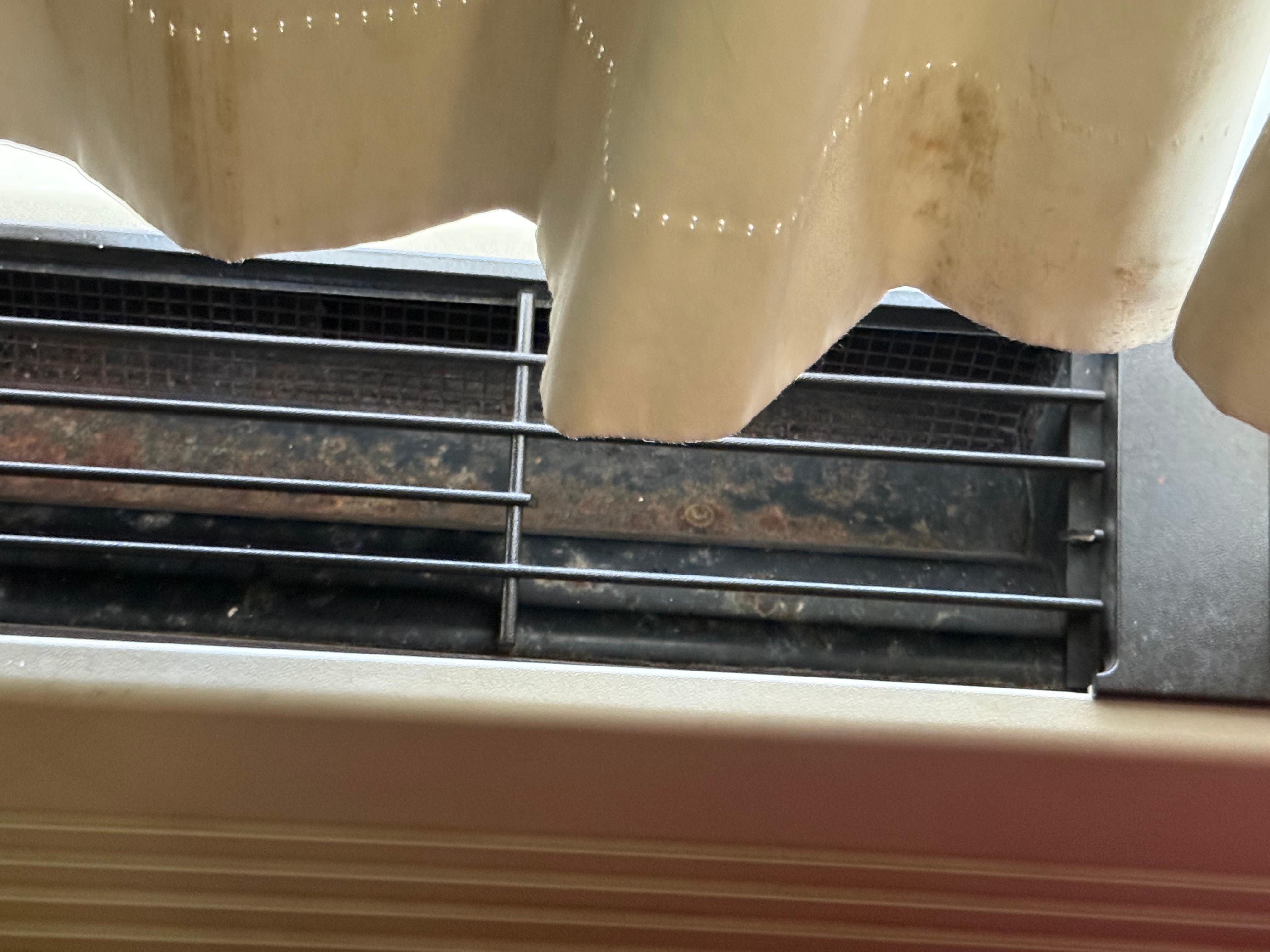 Inside the air conditioning unit.!plus curtains were very dirty.
