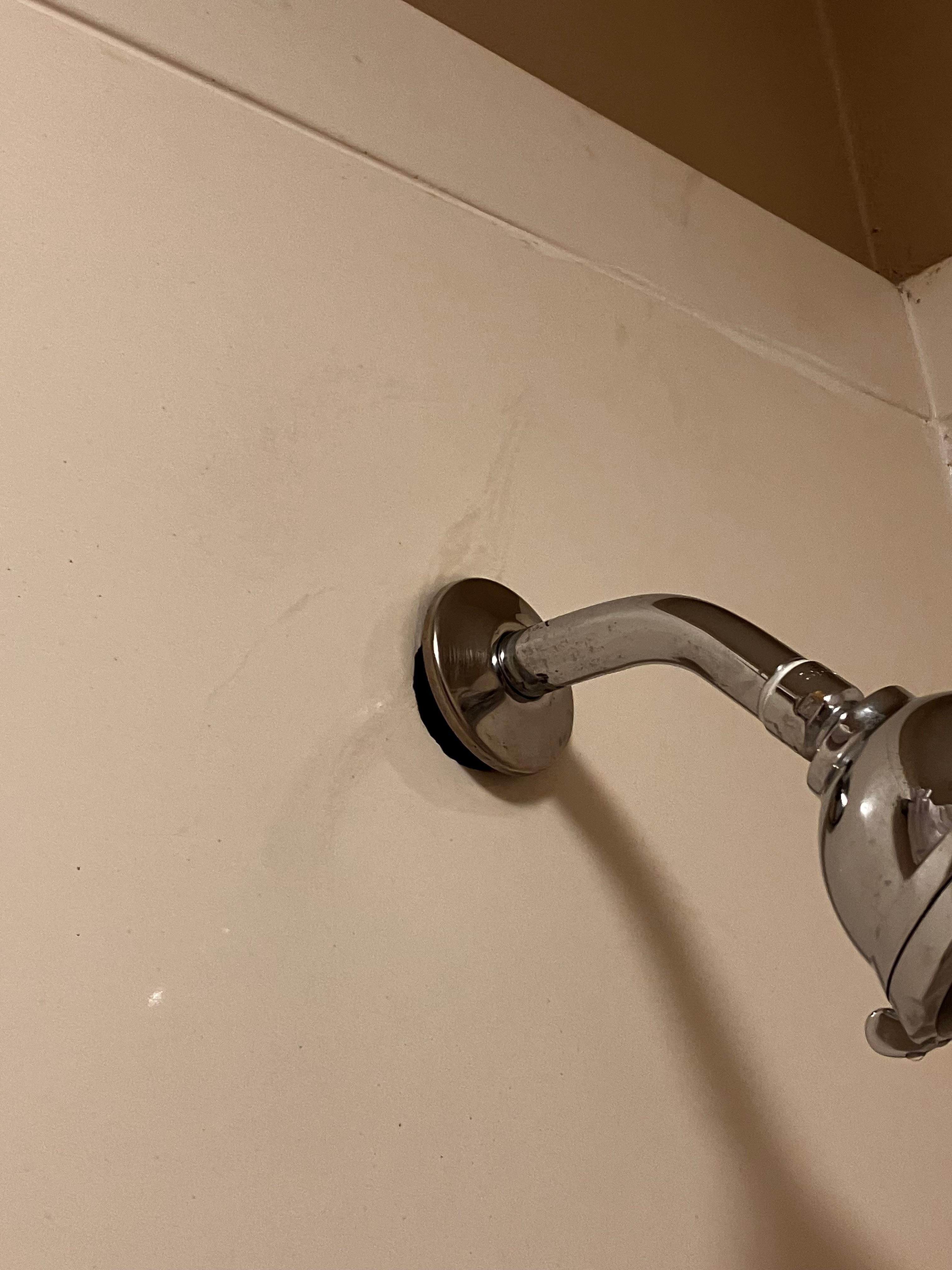 Shower head not attached to wall