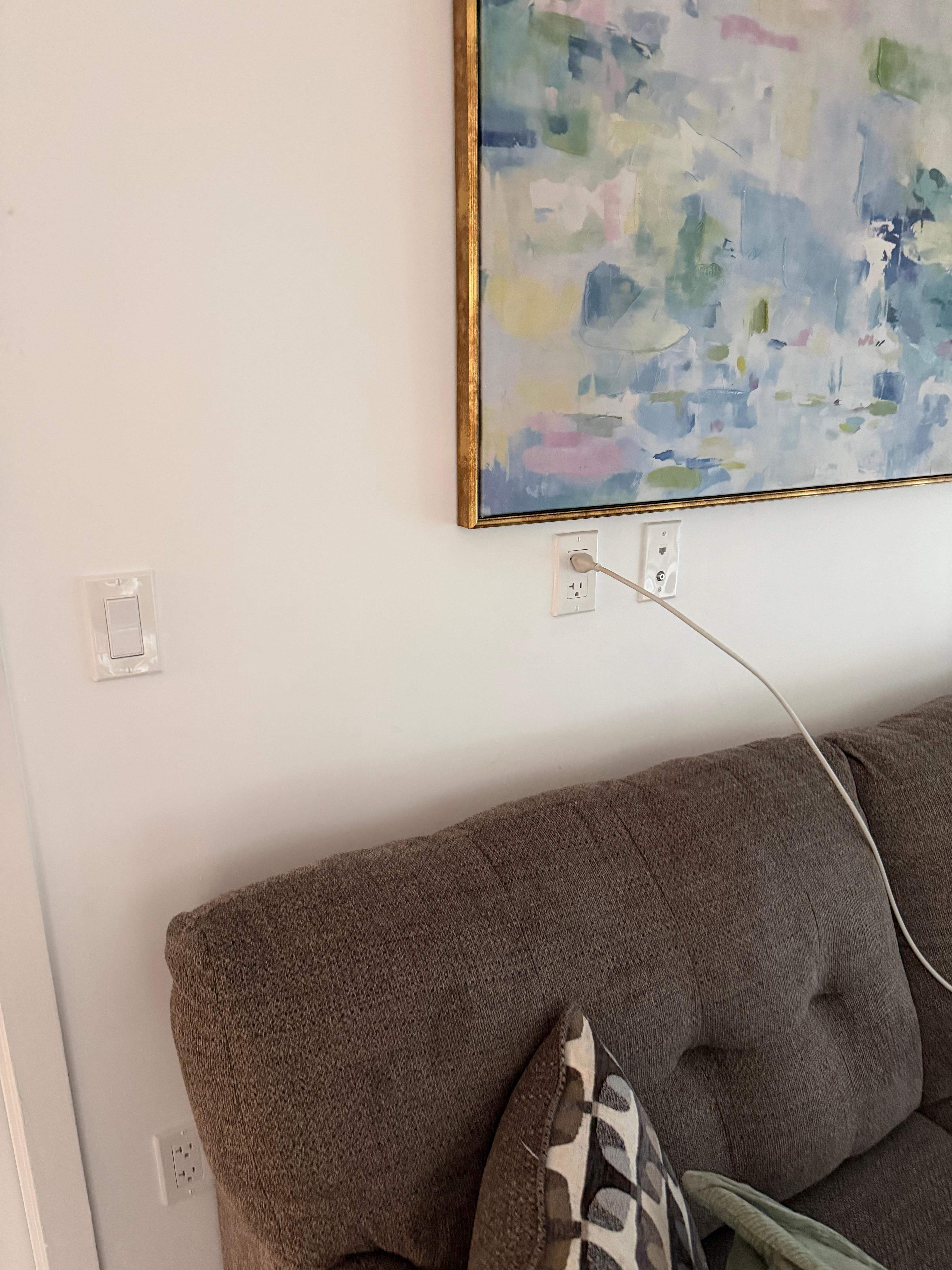 The motel art picked randomly from the Target "Art" stack will depress and, somehow, make this ugly space even uglier.