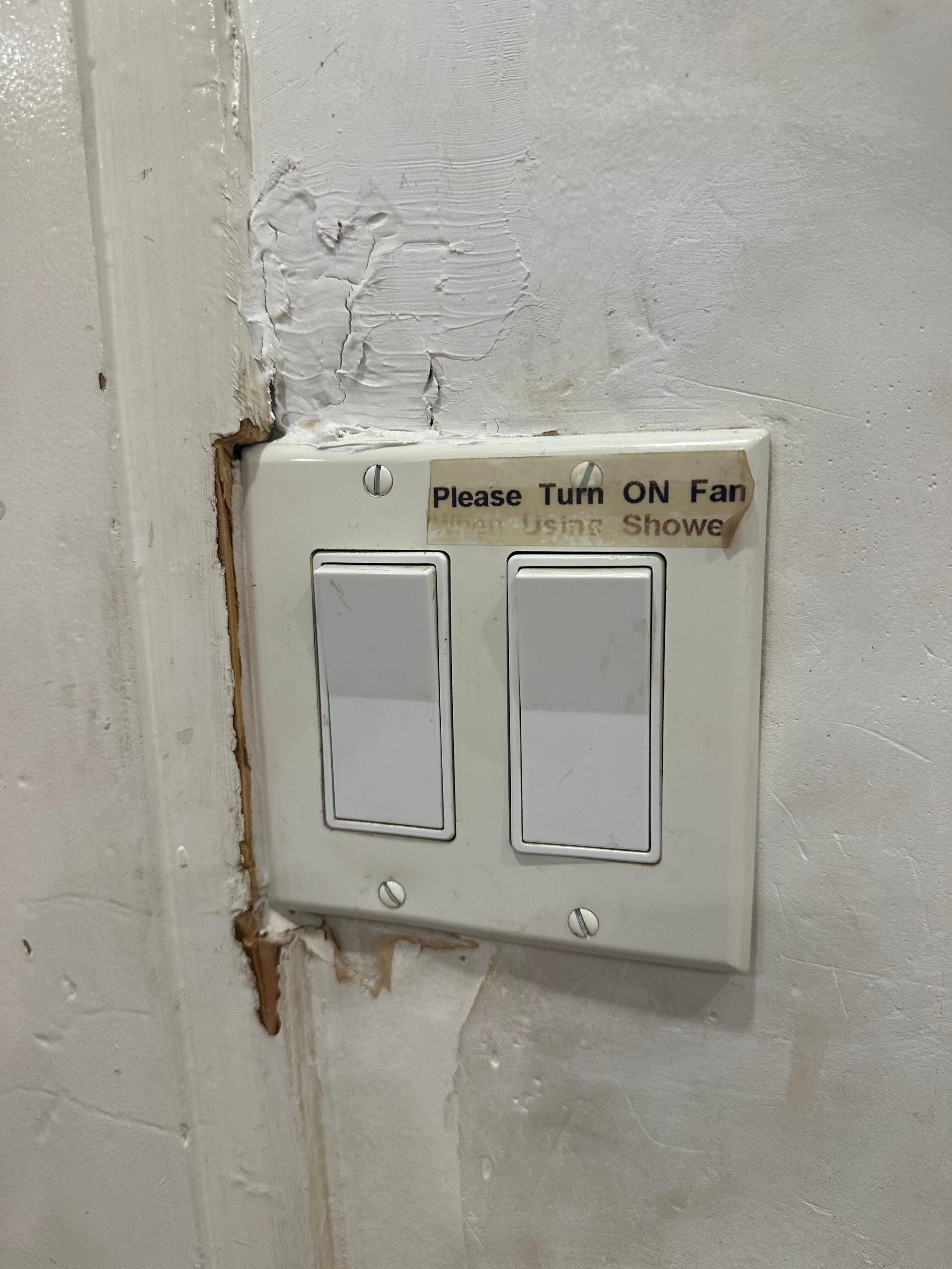 Damage around bathroom light switch