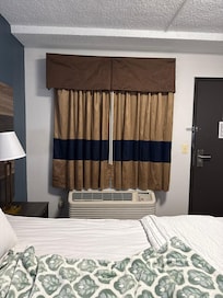 Old curtains and a heating/cooling machine that sucks. You’re either sweating or freezing.