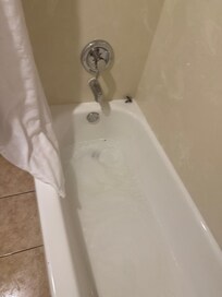 tub filled immediately when I tried to shower. mat inside tub felt slimy and had visible black mold underneath.