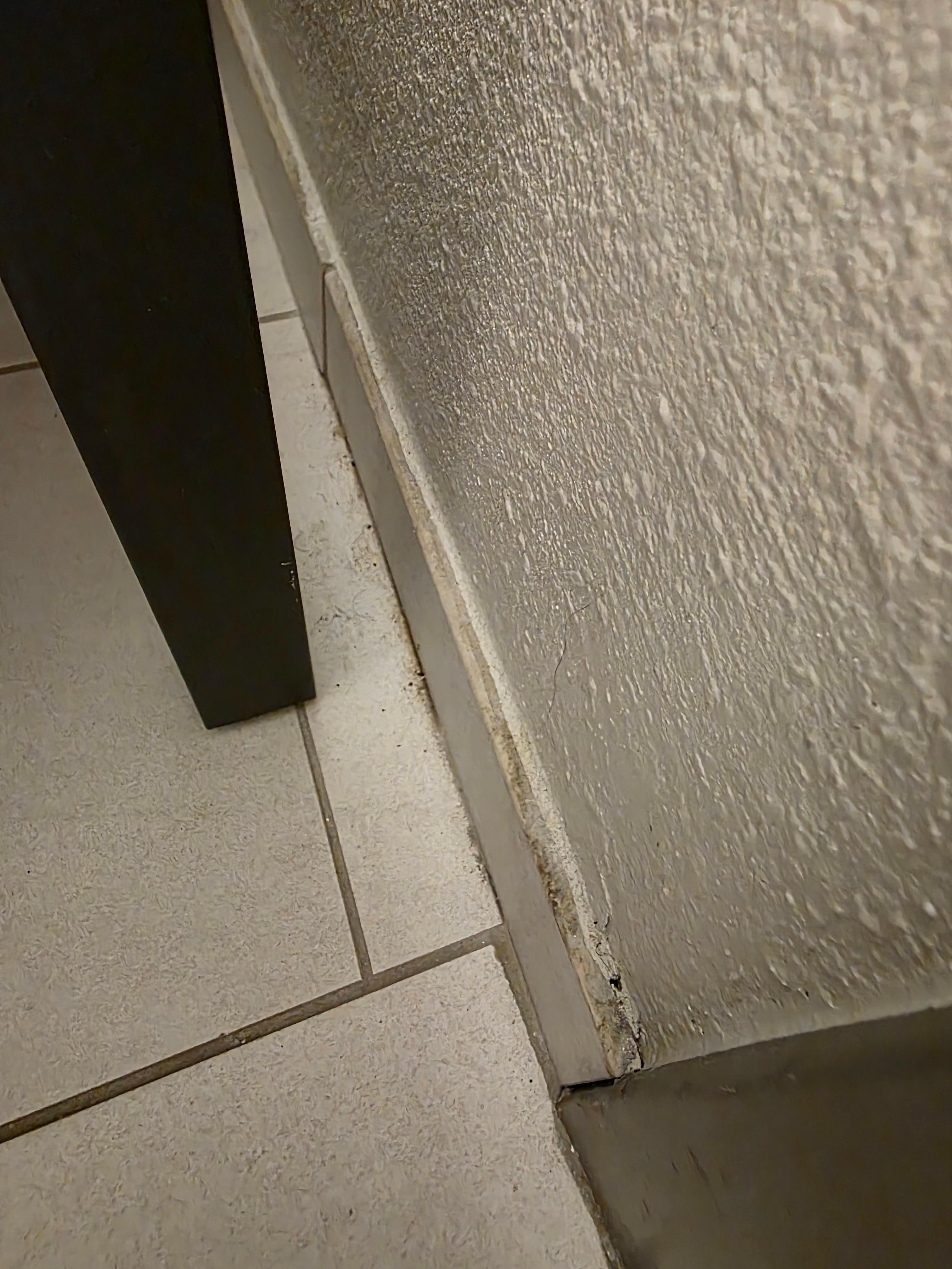 Dirt caked baseboards