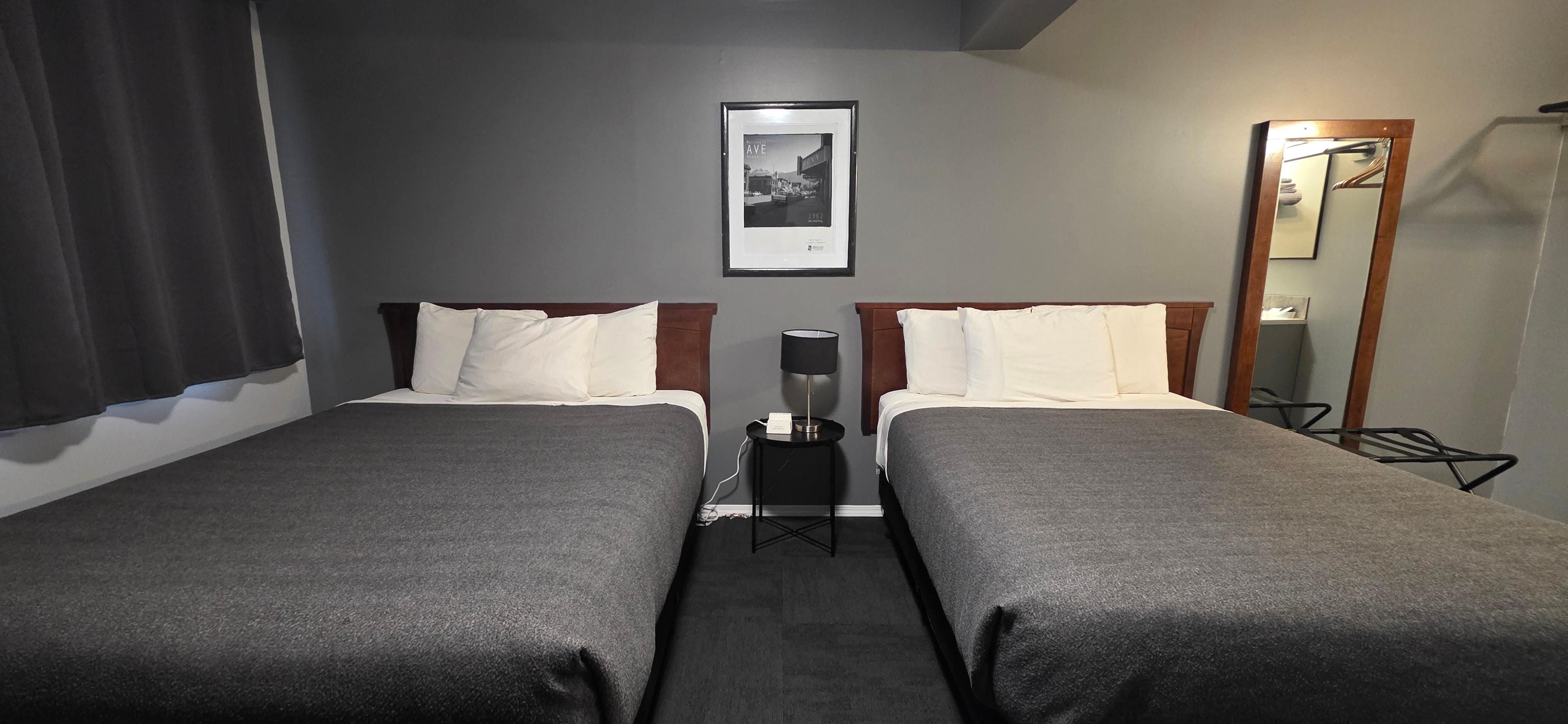 View of two queen beds