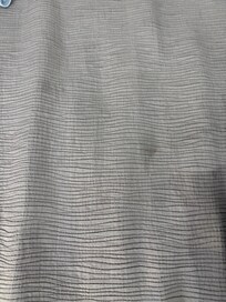 Small dirty areas on the bedspreads. It was a lot bigger than shown here.