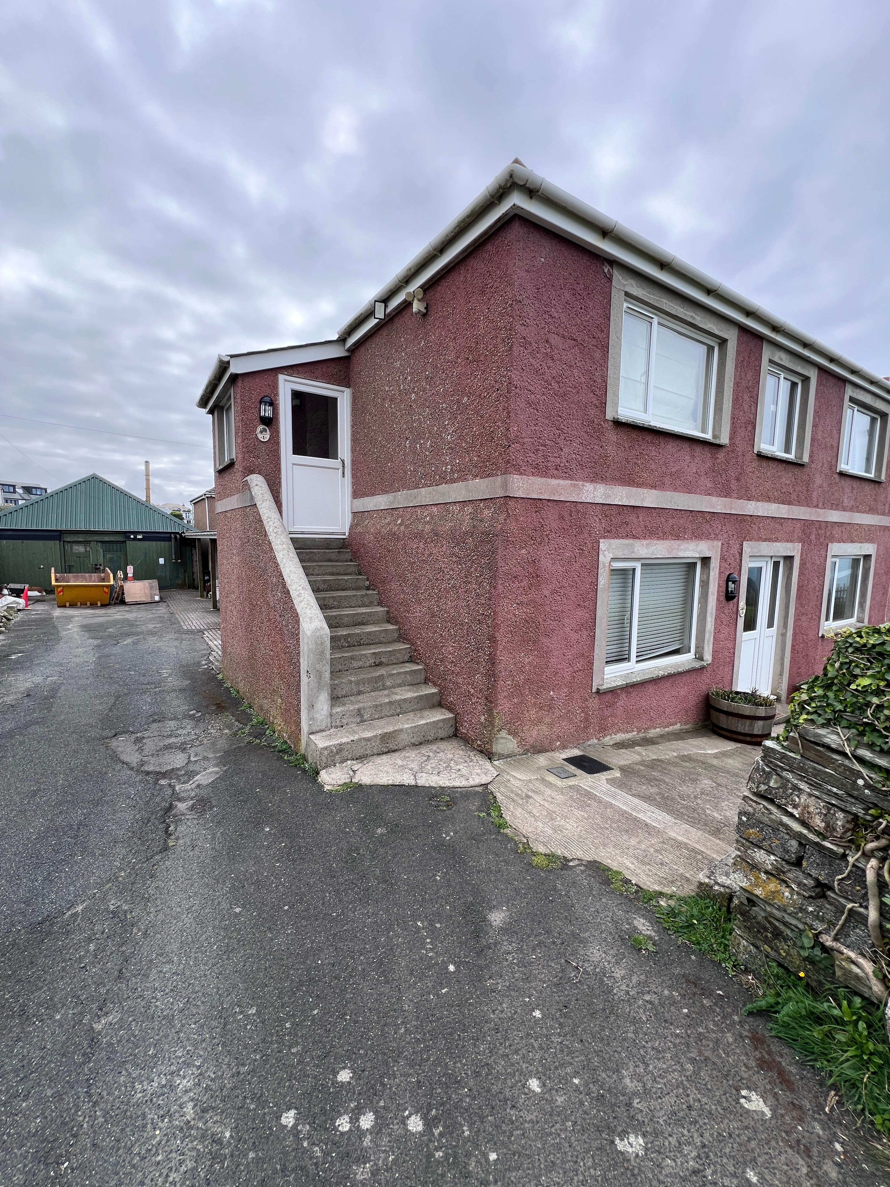 The “luxury apartment” block! This is not shown on the listing! If it was, you wouldn’t book it. 