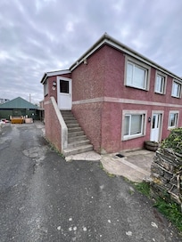 The “luxury apartment” block! This is not shown on the listing! If it was, you wouldn’t book it.