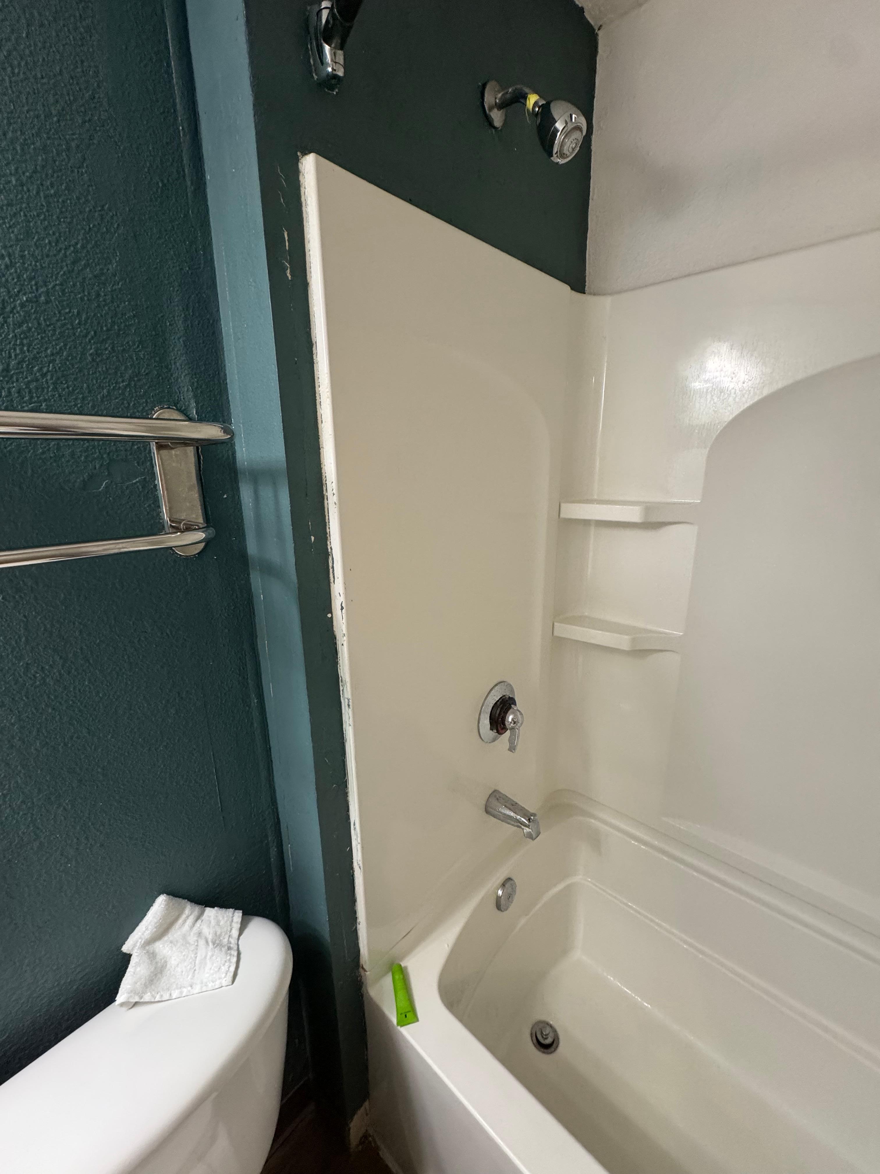 Missing trim, paint, and wall texture falling off