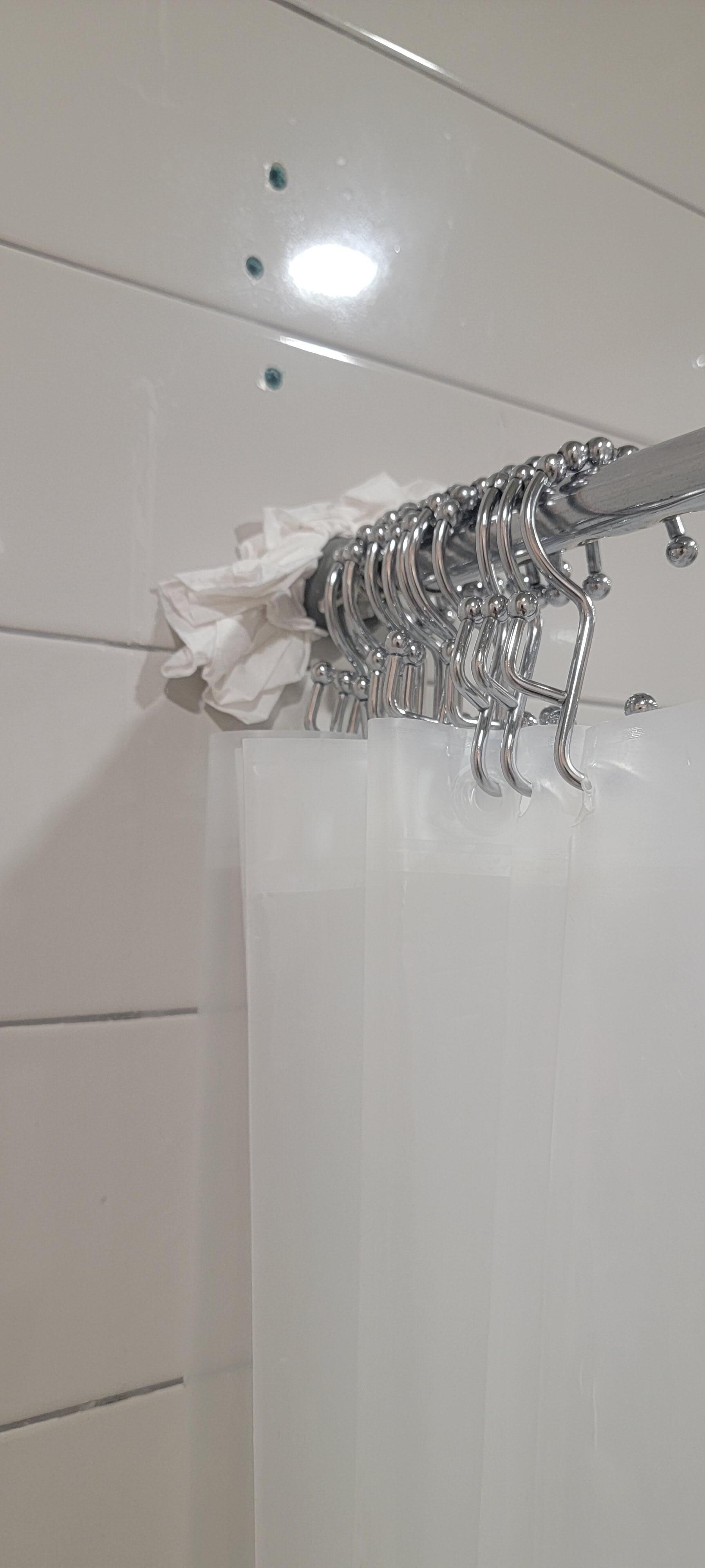 Paper towel holding shower rod