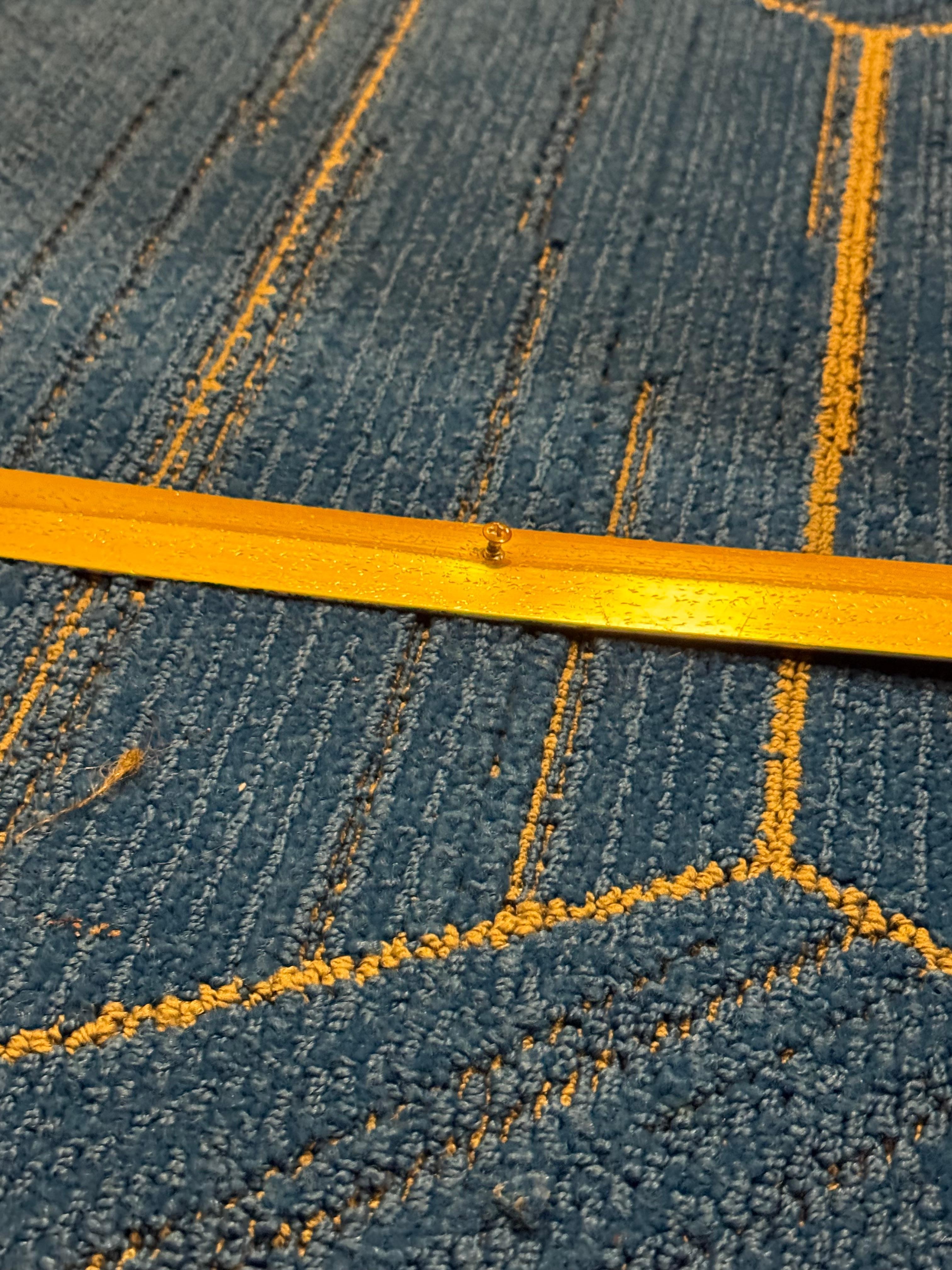 Screws coming out in hallway