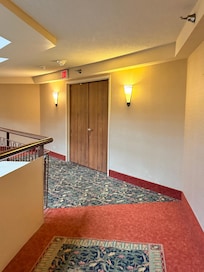 No signage to indicate there were hotel rooms behind this door. They said there was. Clearly there is not.