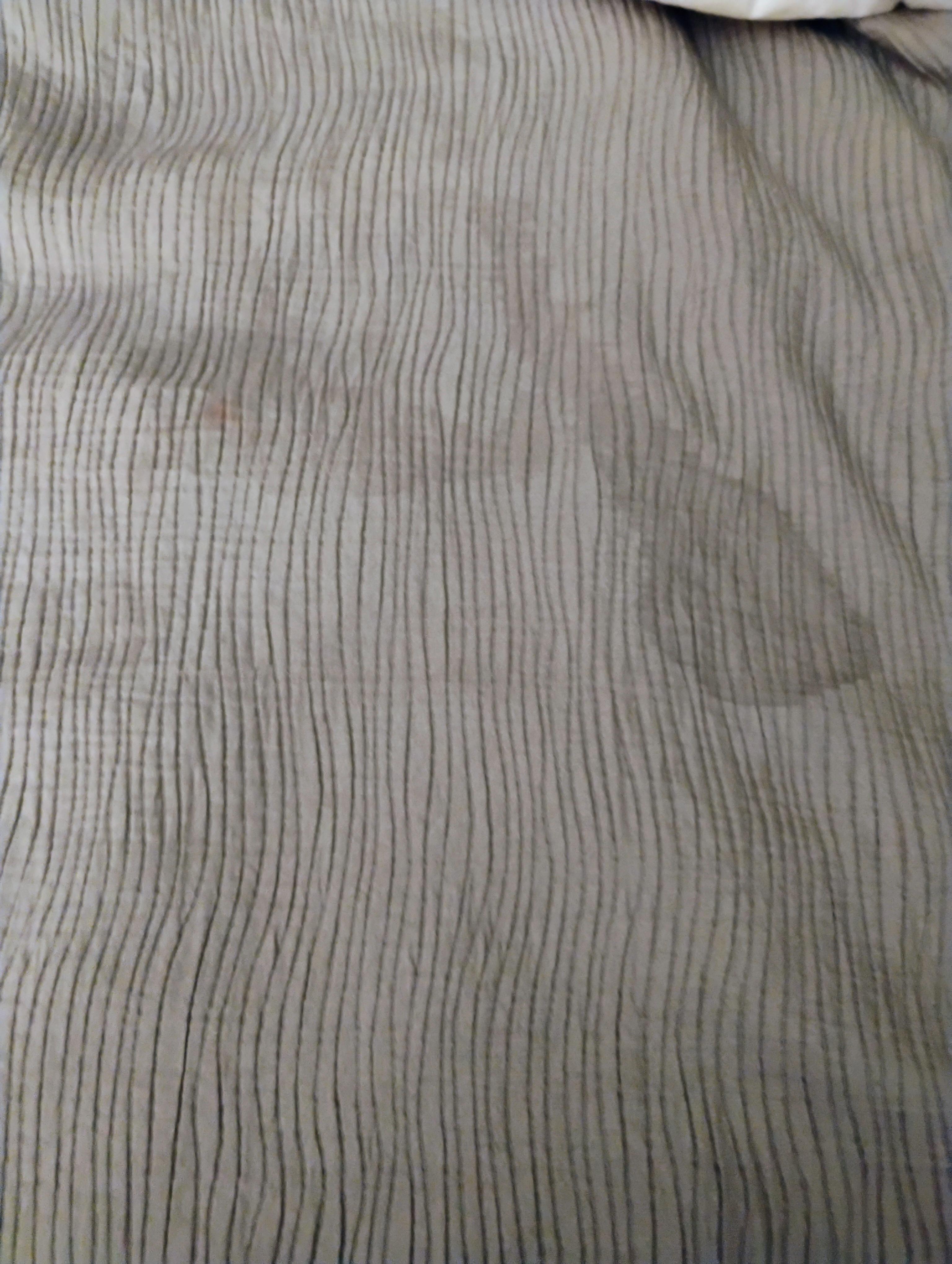 Dried spill. Rough to the touch.