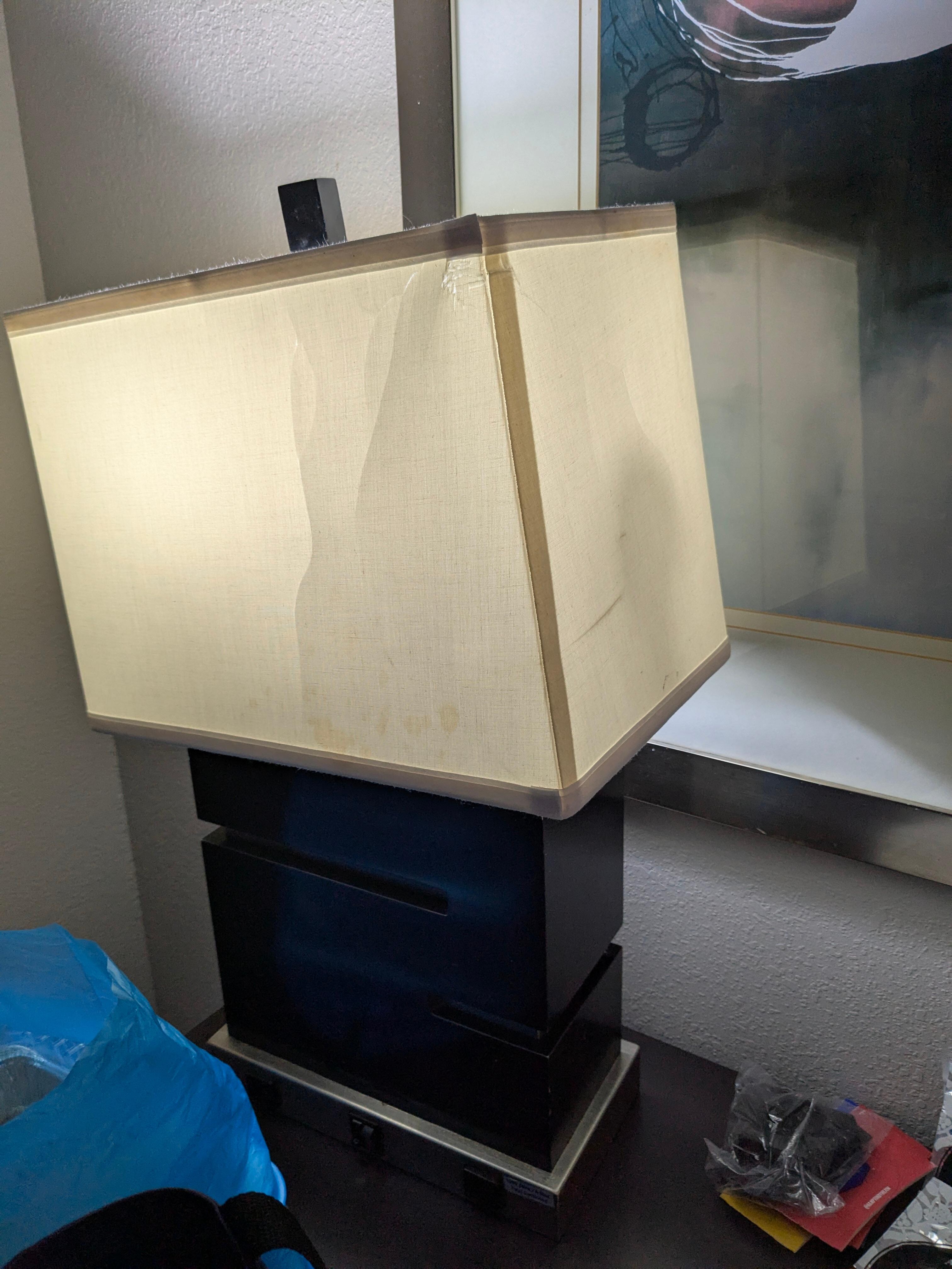 Lamp shade is broken and wouldn't stay straight