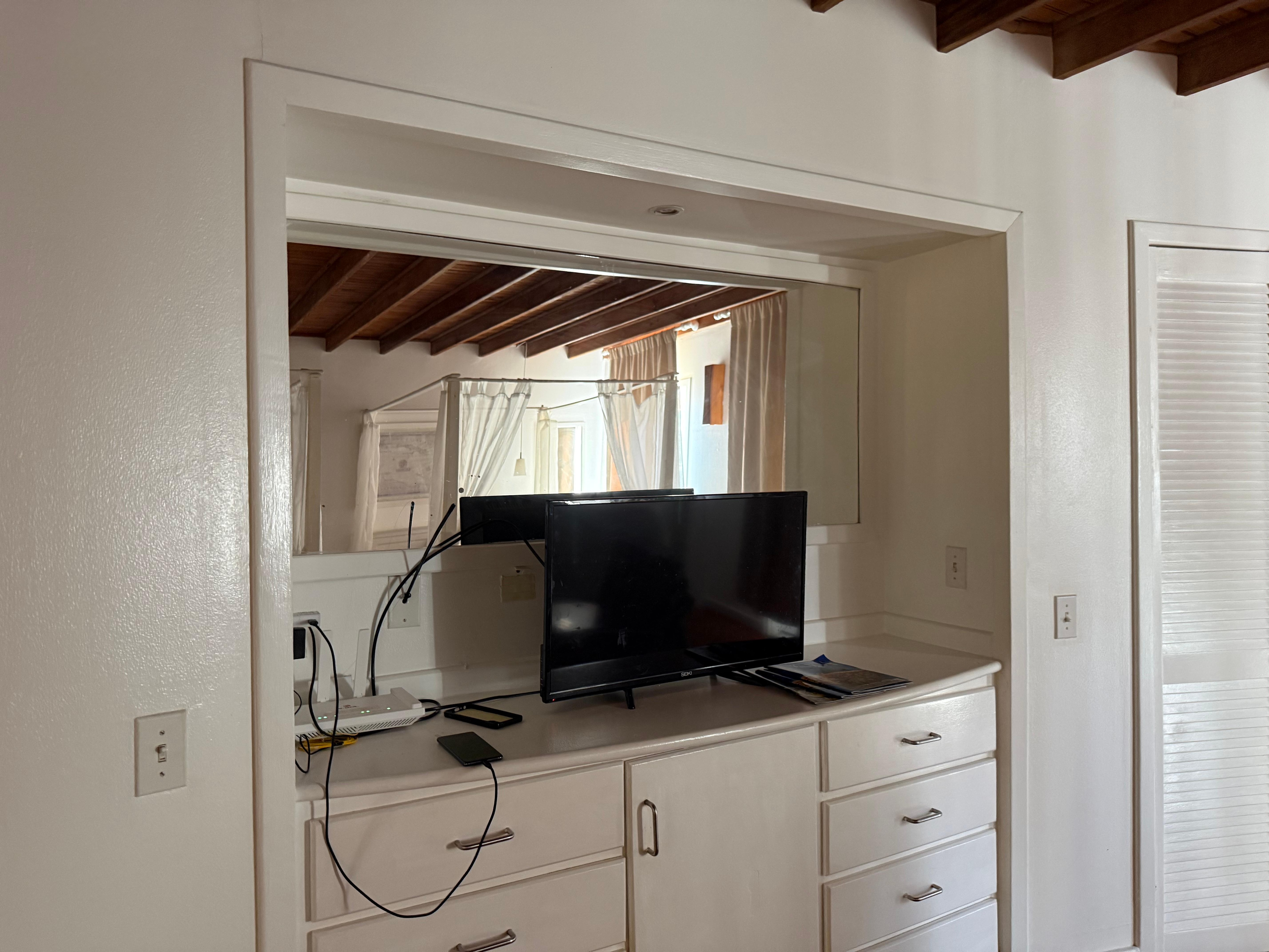 Tiny tv with broken signal. 