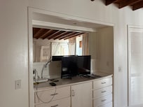 Tiny tv with broken signal.