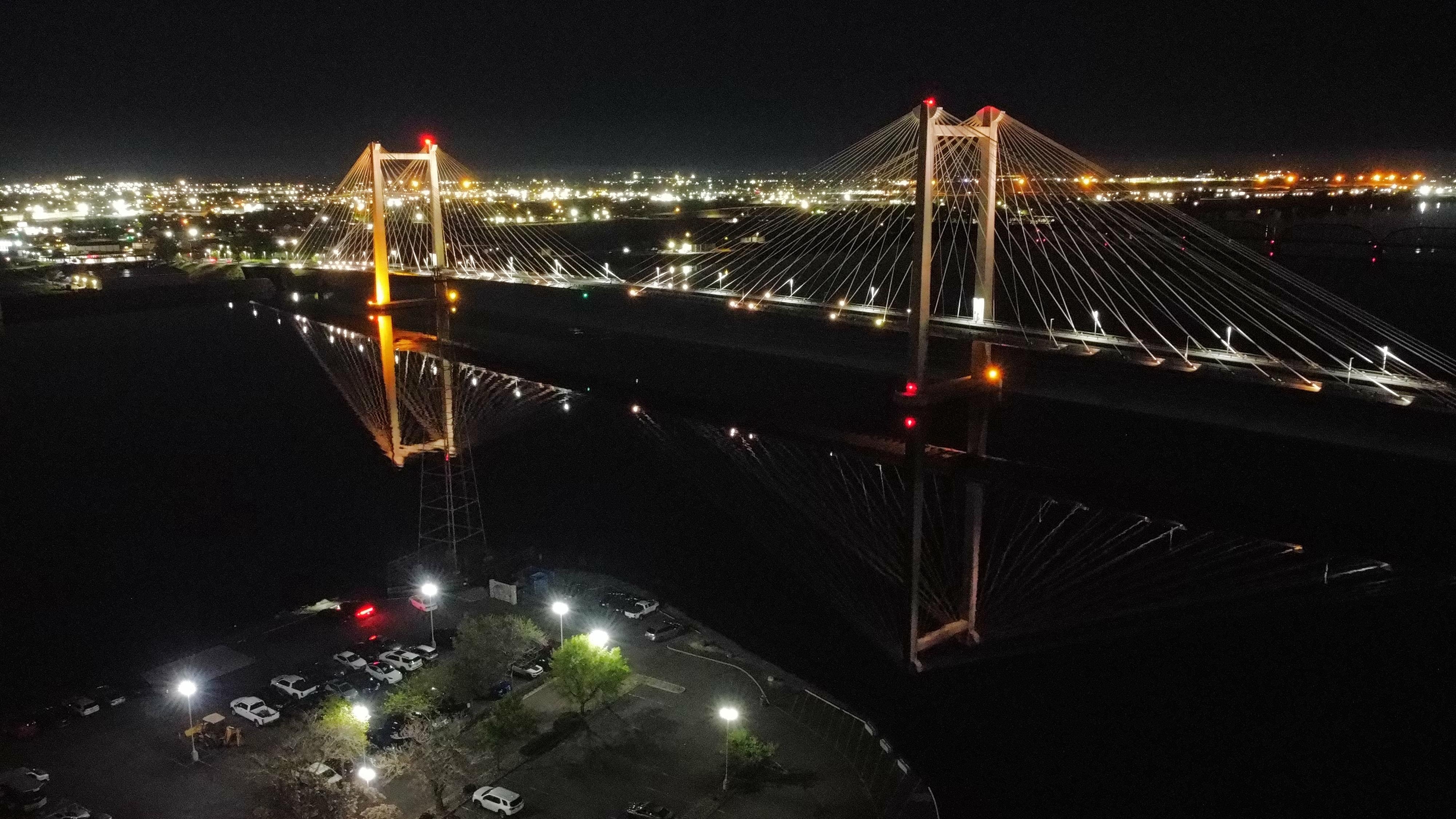 Night shot of the Cable Bridge.  Lots of teenage traffic using the parking lot to view the bridge at night.
