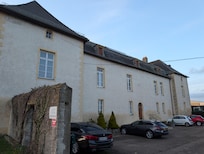 Front of building where the entrance can be found.