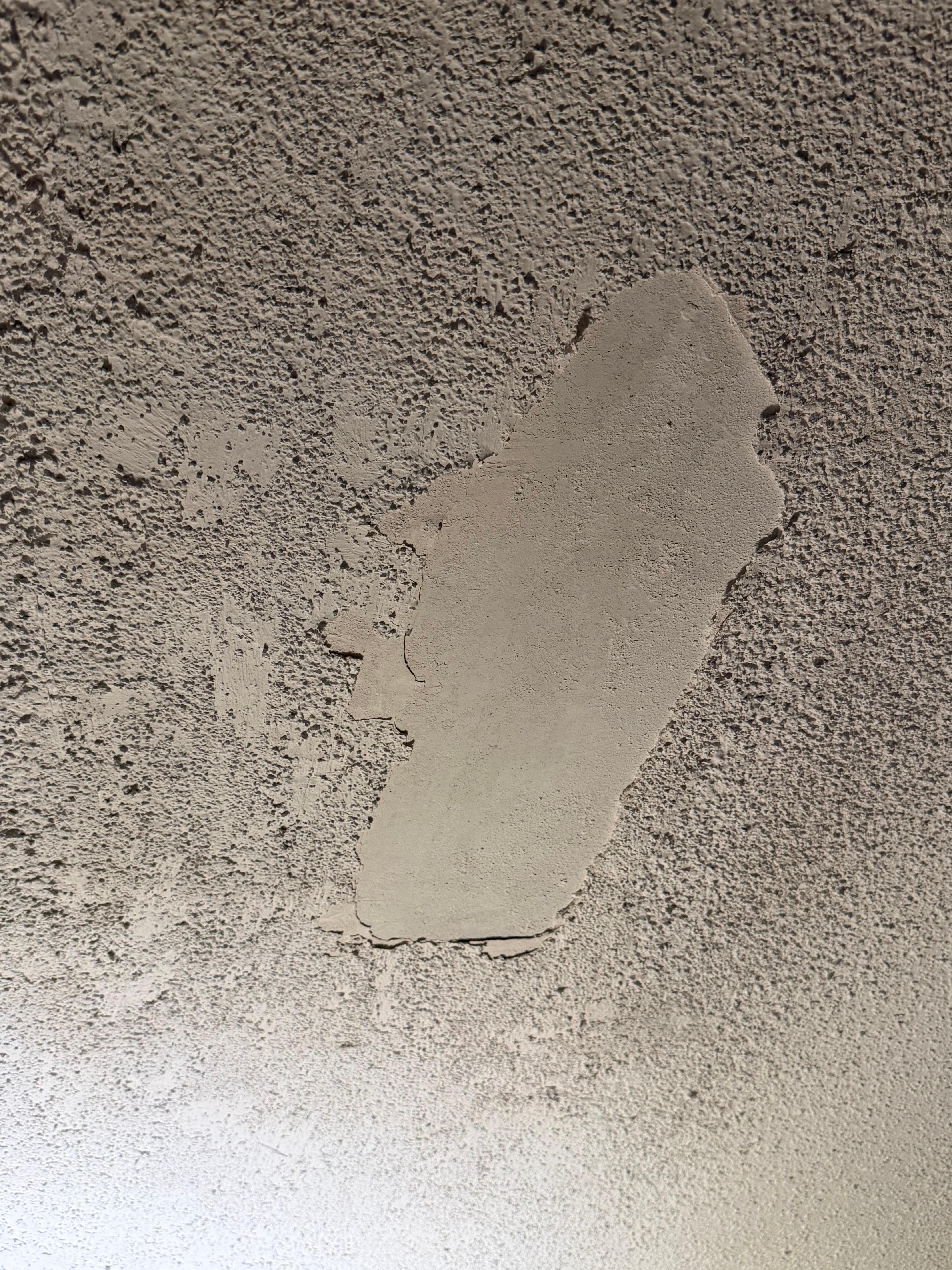 Popcorn ceiling falling down