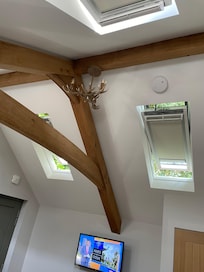 Velux windows in roof of cabin which keeps the temperature down in summer without compromising security