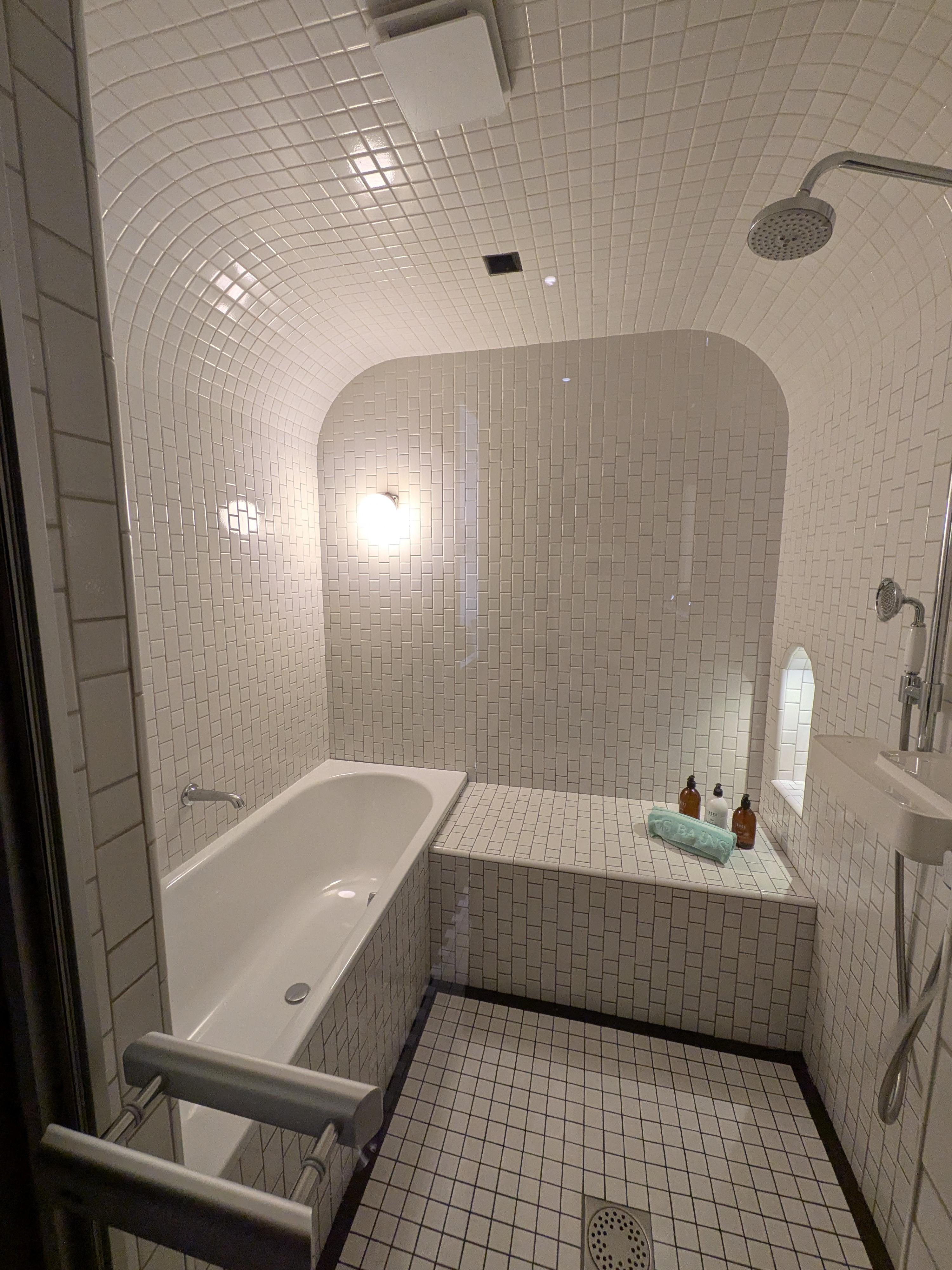 Bathroom/steam room which is off the main washroom. 