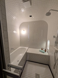 Bathroom/steam room which is off the main washroom.