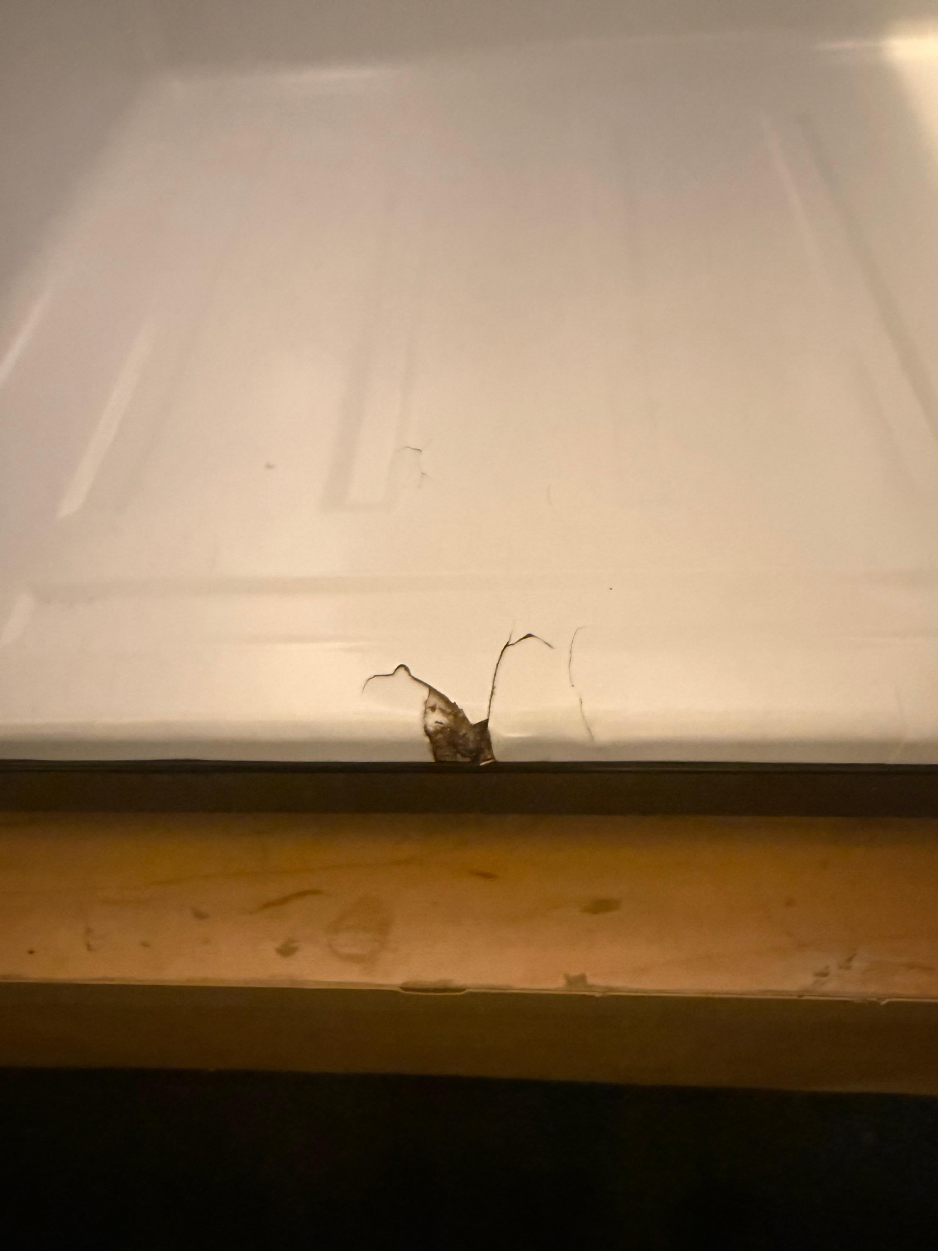 Dirty fridge with cracks