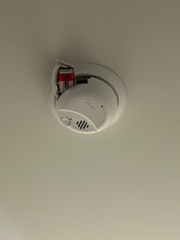 Battery popped out of smoke detector.