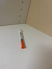 Hypodermic needle found in kitchen drawer