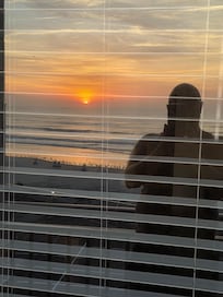 Reflection of sunrise in window, picture take from balcony