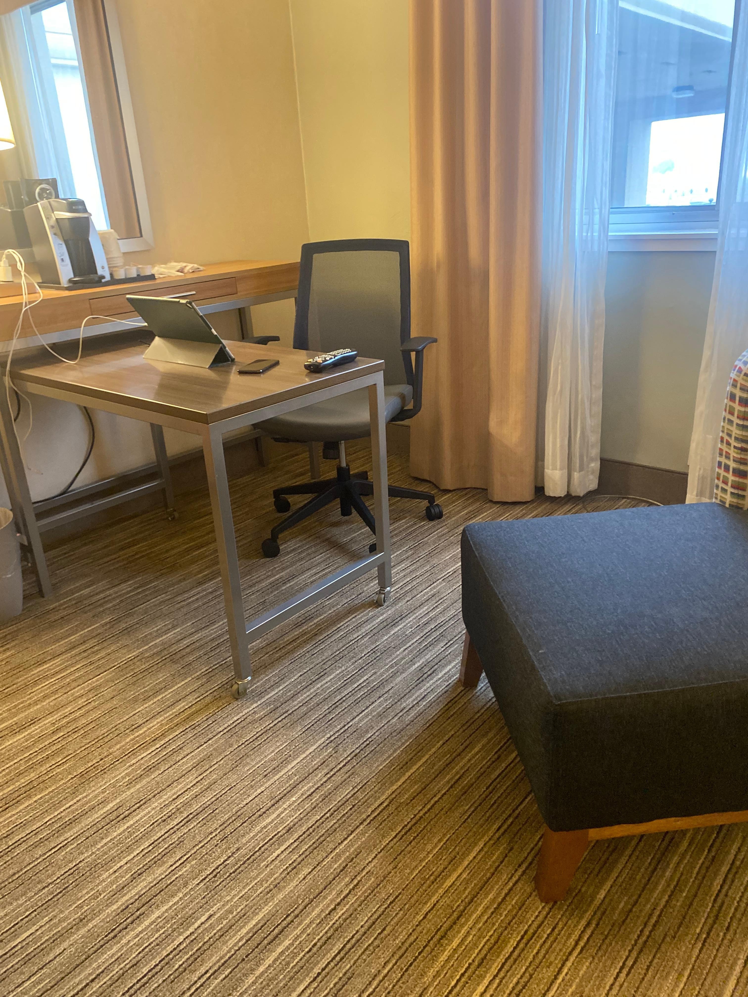 King Bed with work center and chaise seating.