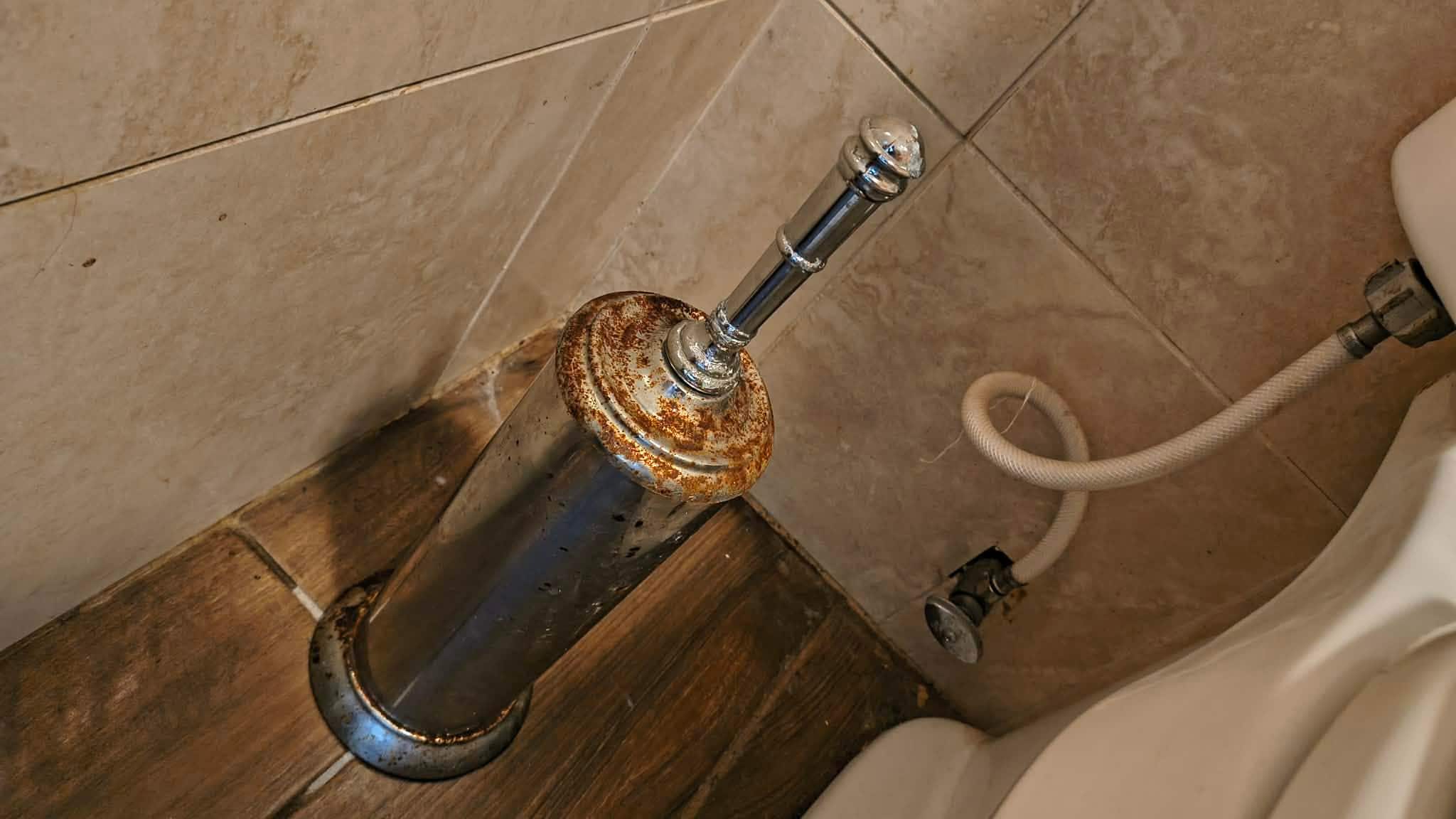 The room itself was disgusting — stains everywhere, and after taking a shower you could not walk on the carpet barefoot without your feet turning black almost immediately. I had to use multiple towels just to walk across the floor. There were stains 