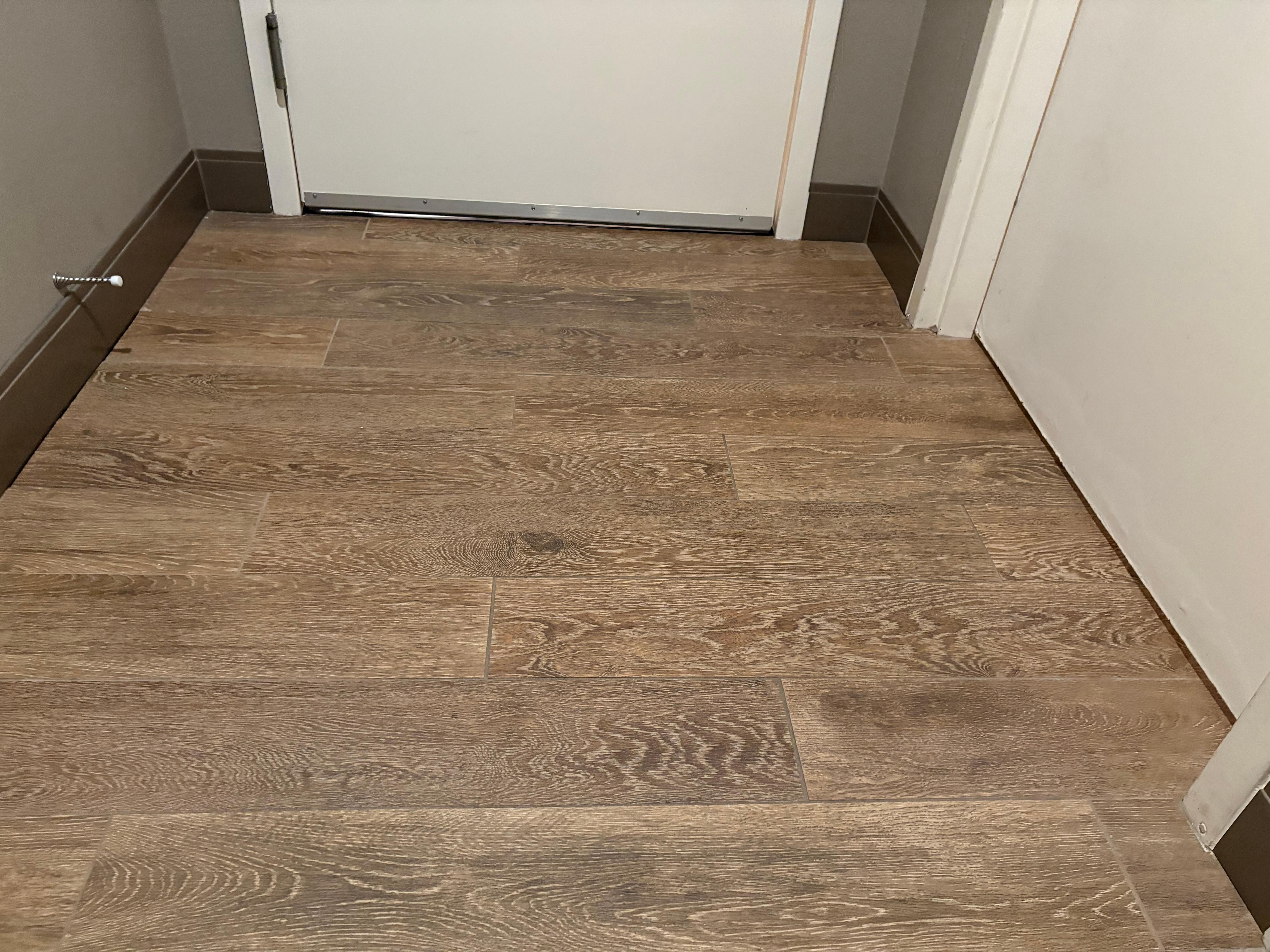 No door insulation where someone can place an I just under the door.