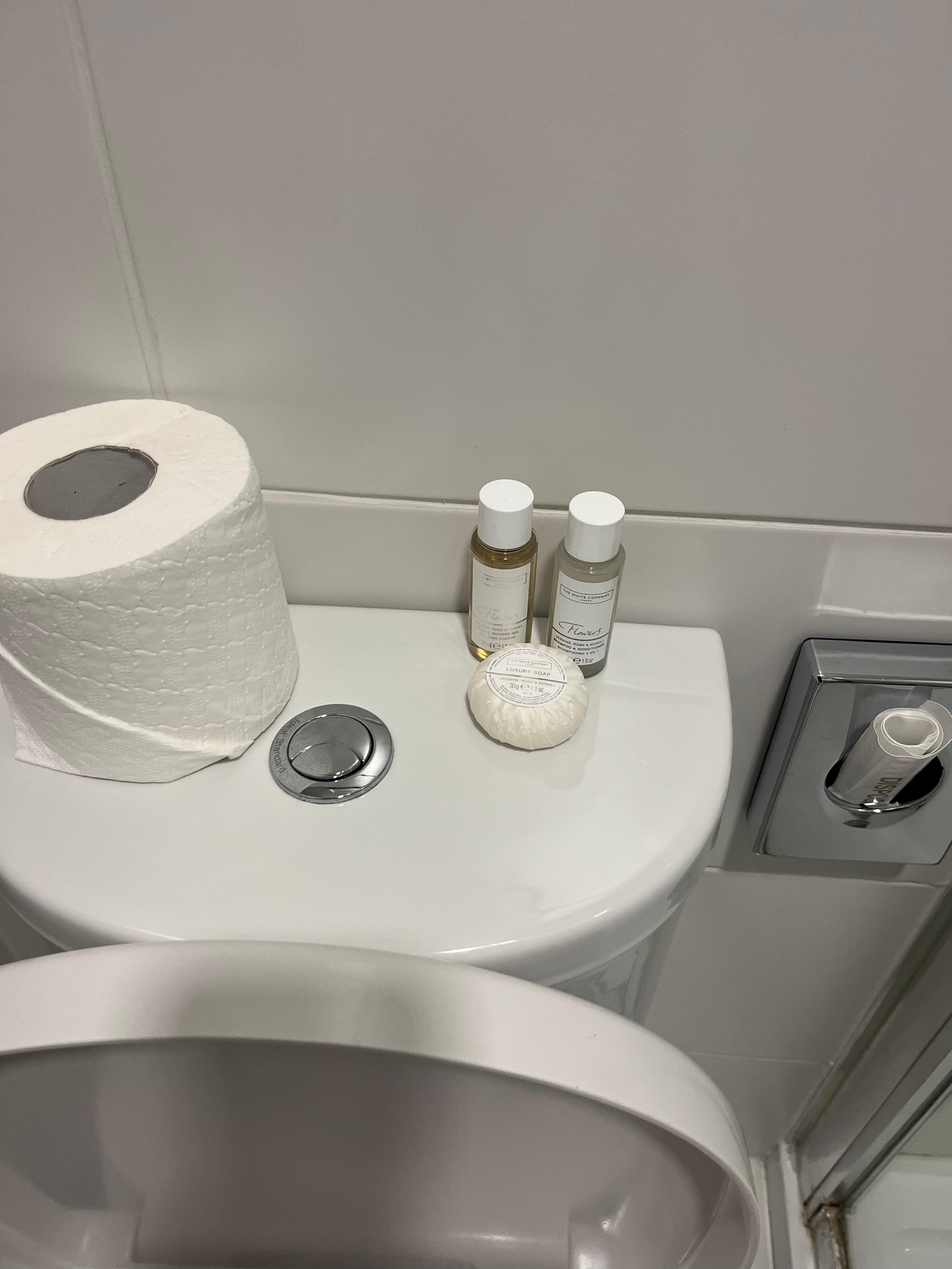 2 small bottles of toiletries 