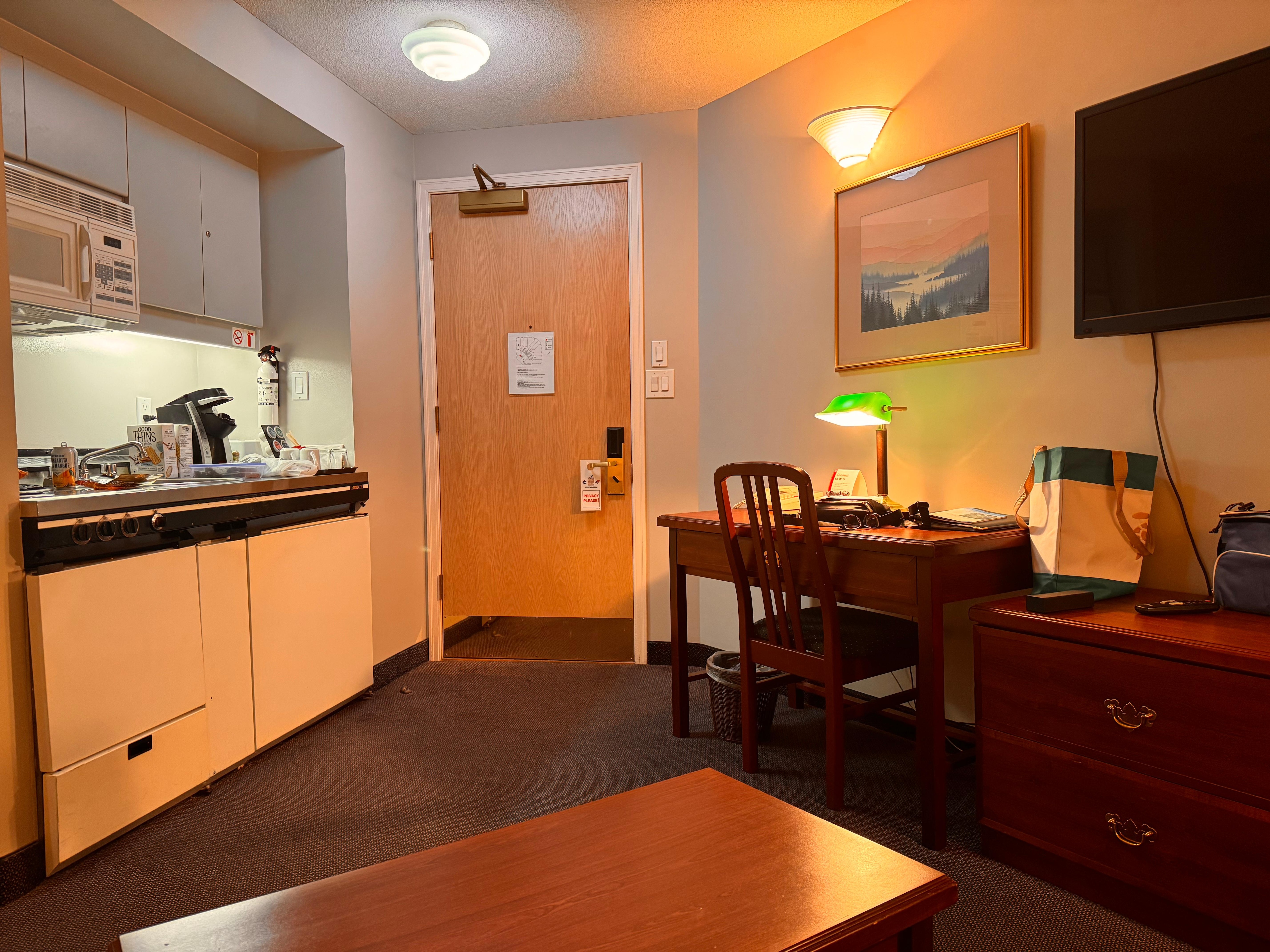 Entry area with seating, TV and kitchenette.  