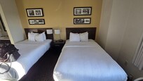 The 1st room with the stale smell and dirty window which is supposed to have 2 double beds. They were singles.