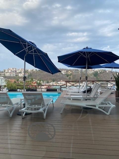 The curtains can only be left open very early in the morning, when there is no one in the pool yet.