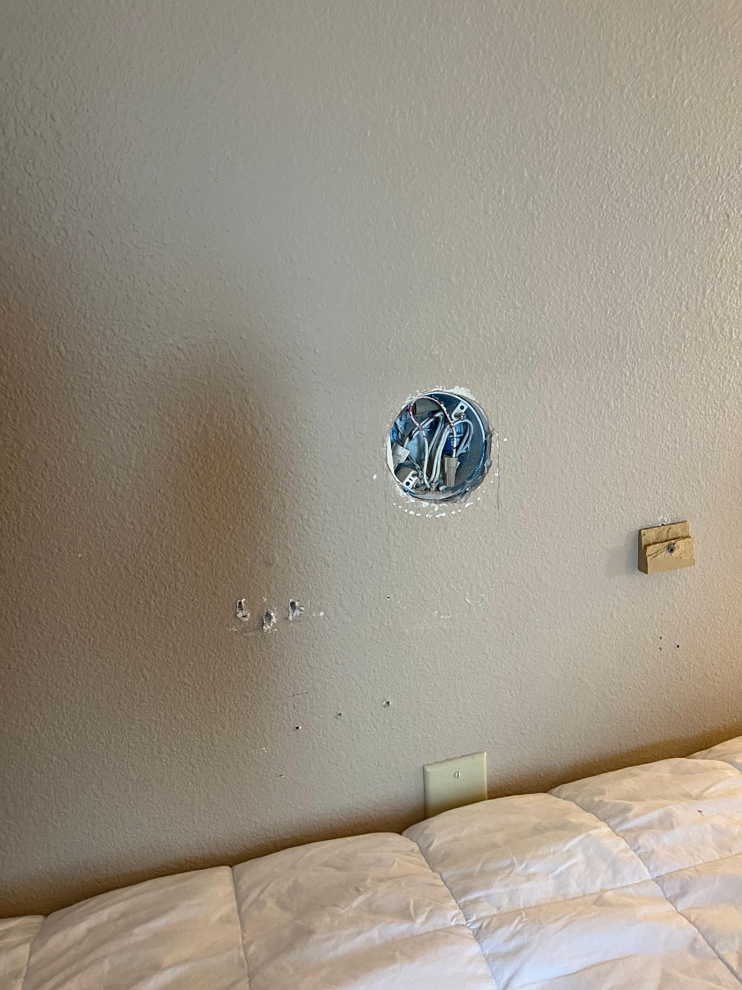 Electrical box behind headboard 