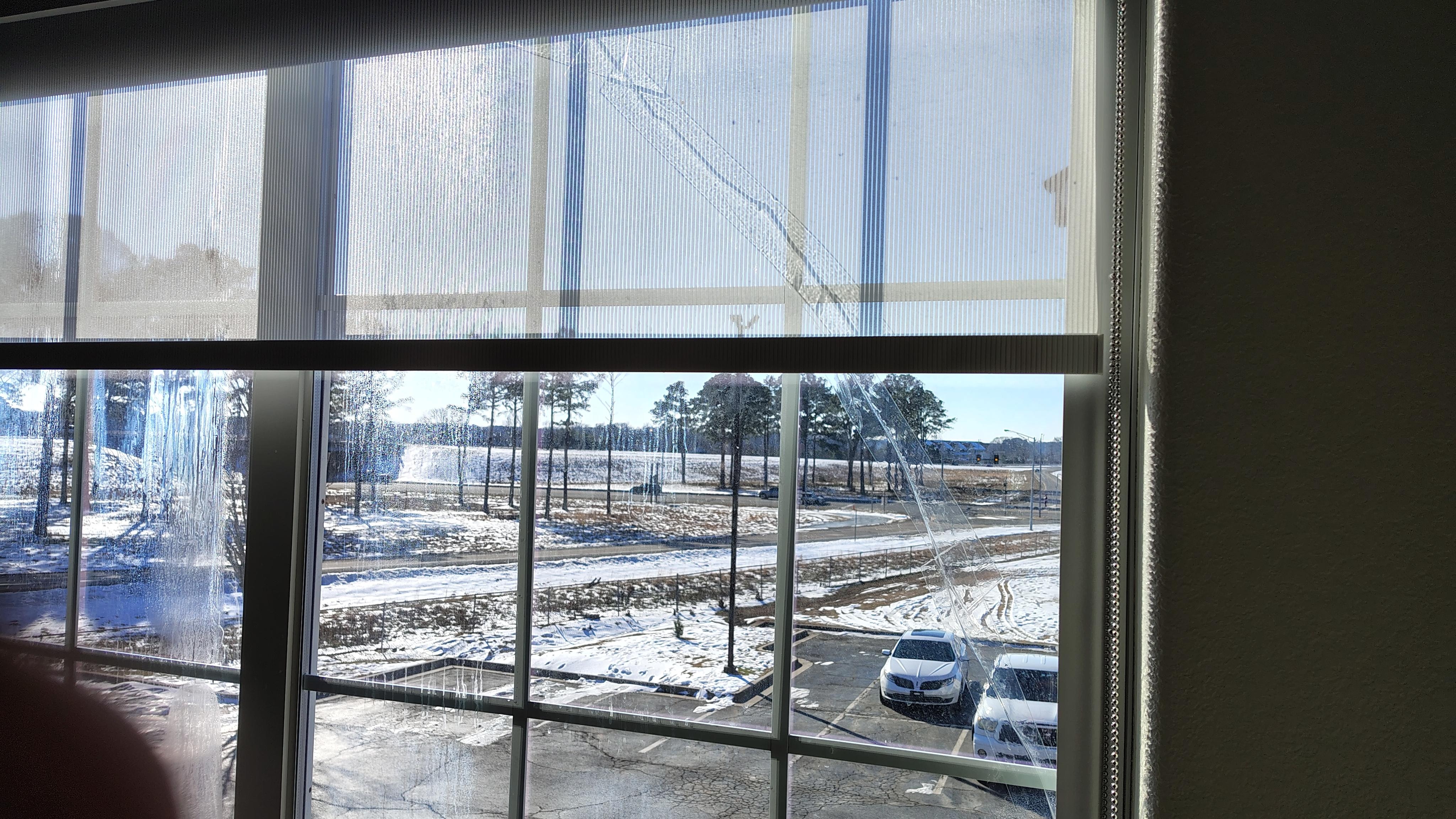 This image shows the window with the crack taped over.