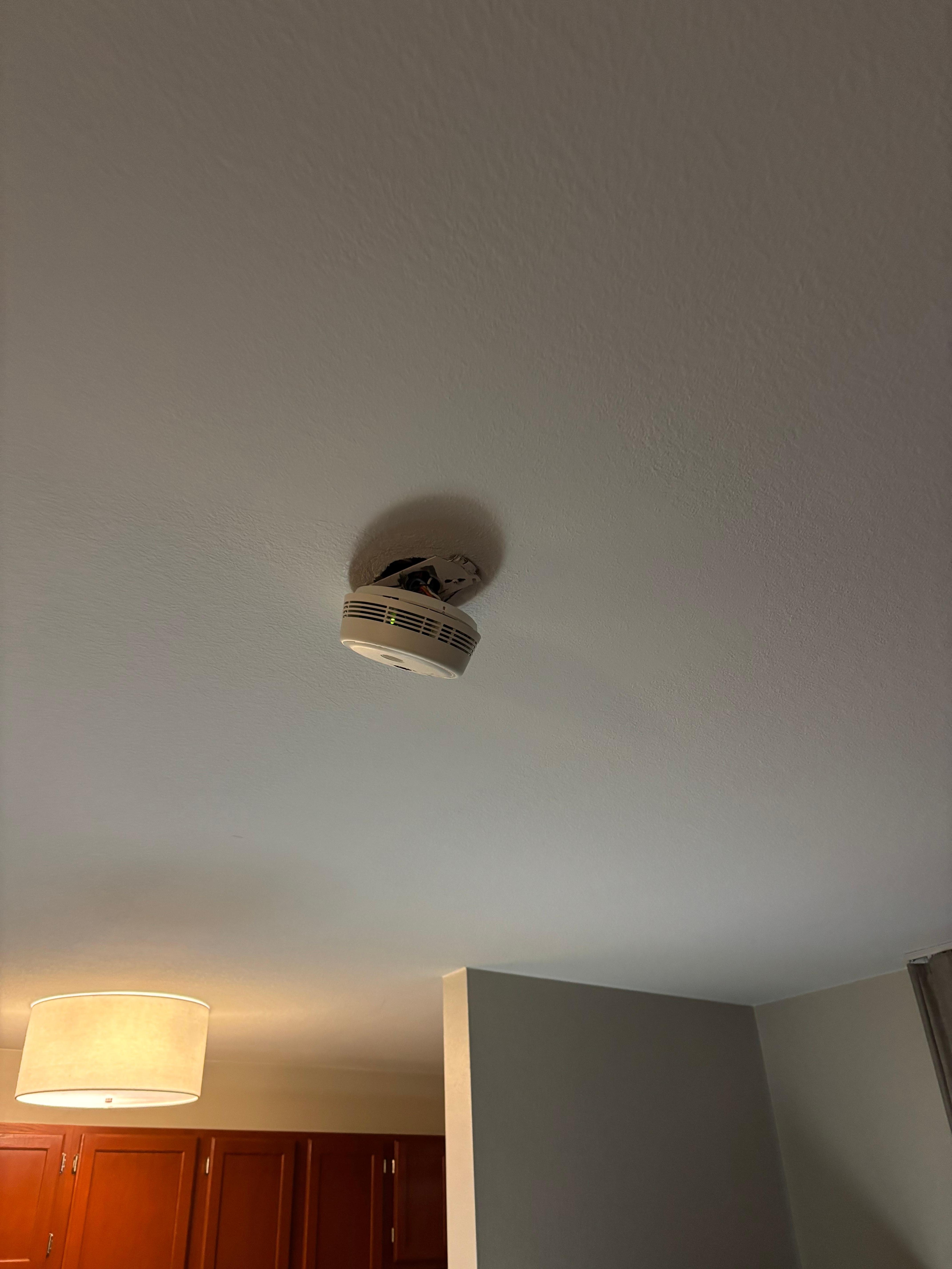Smoke detector falling out of the ceiling. 