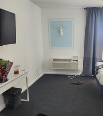 Room was missing seating, smelled like chemicals, and felt more like a motel.