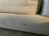 Not sure what this was wiped on the couch. Was also on the top.