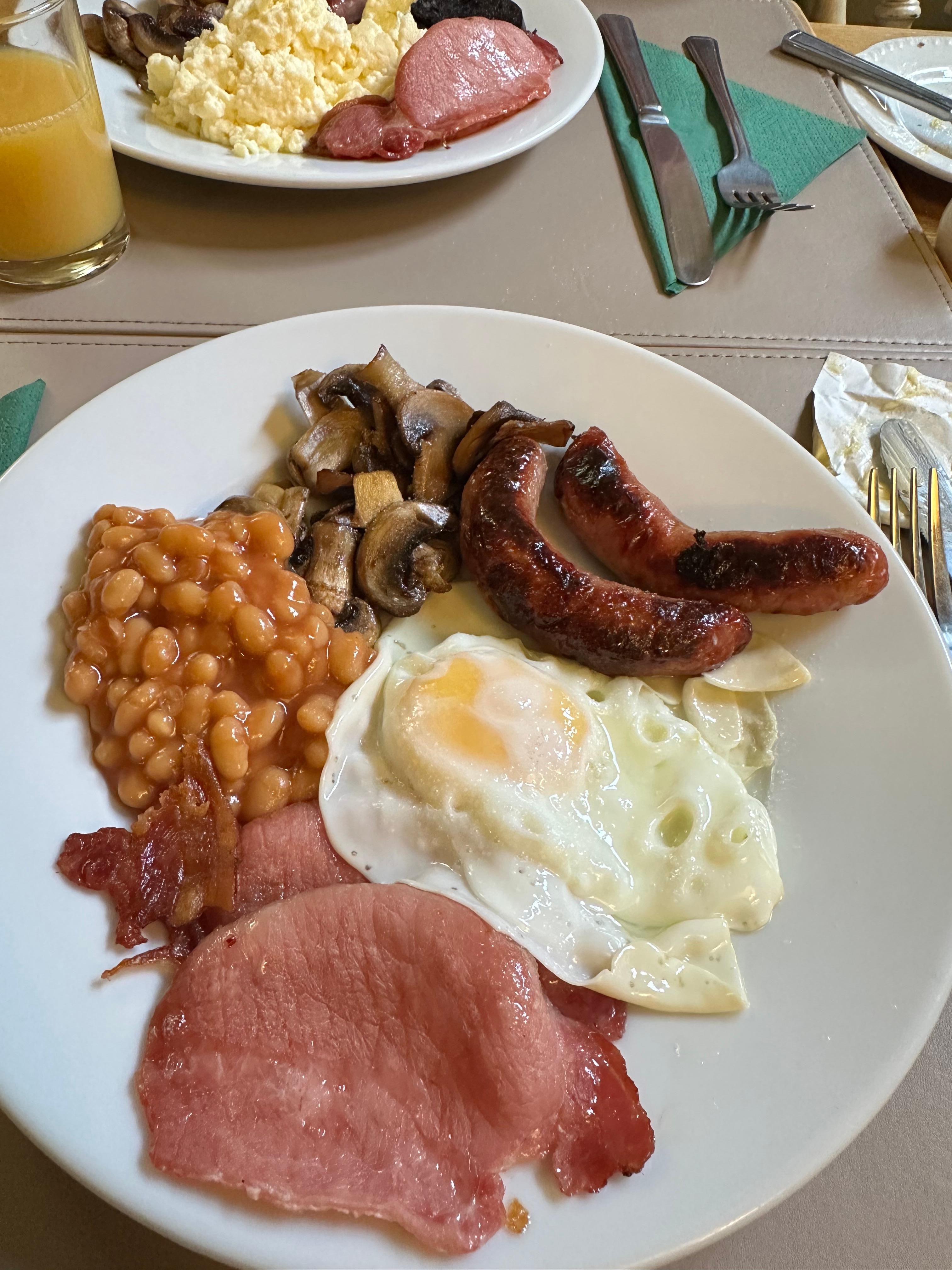 Breakfast minus the tomato and black pudding available. Cereal and yoghurt available with croissant and toast