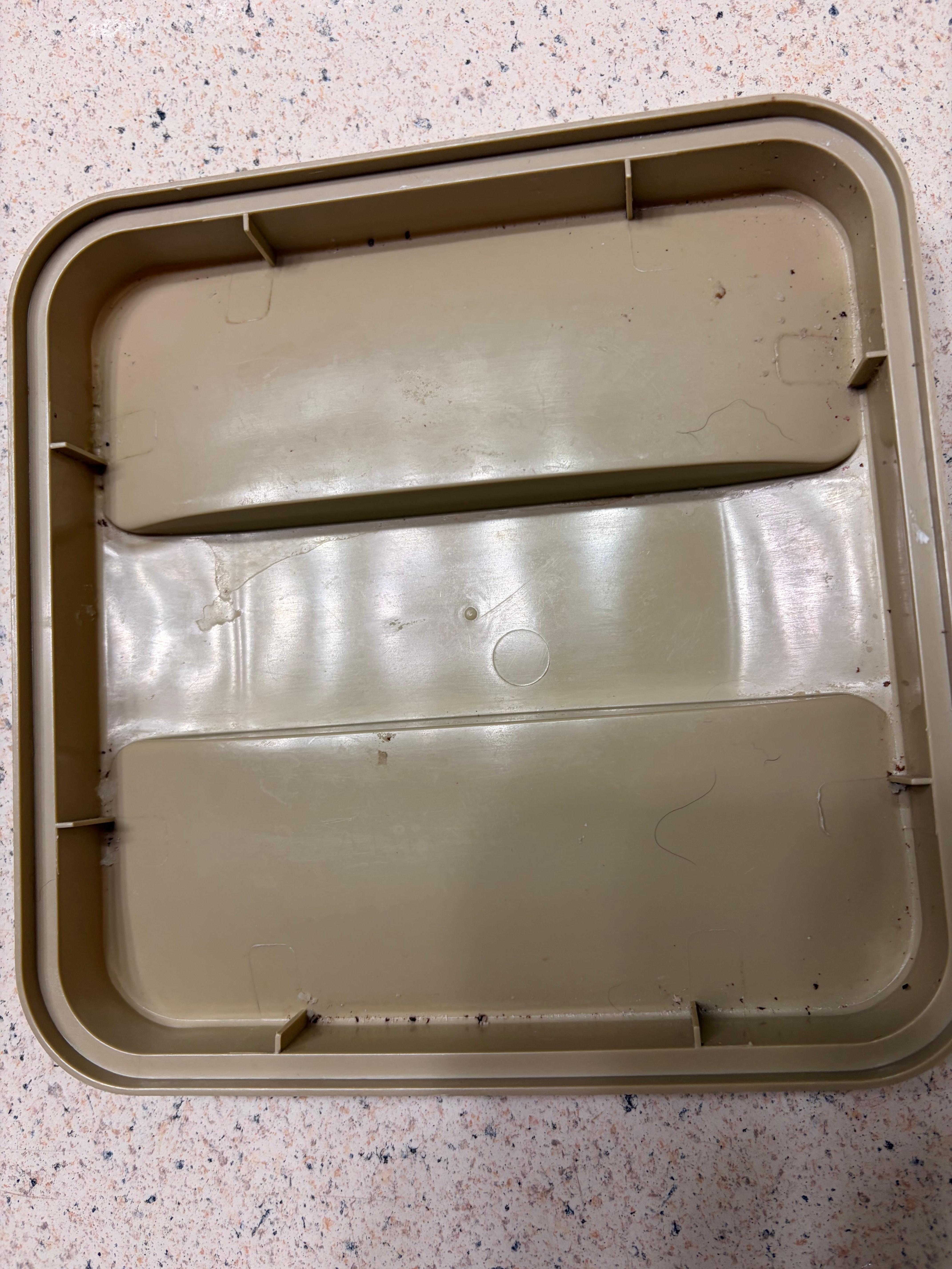 Grime and hairs all over lid. 