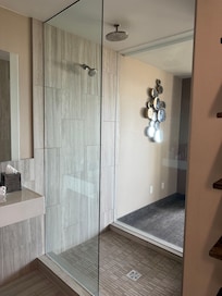 This design makes water get everywhere…(yes there’s a curtain for the other side) and the above shower head was not installed correctly